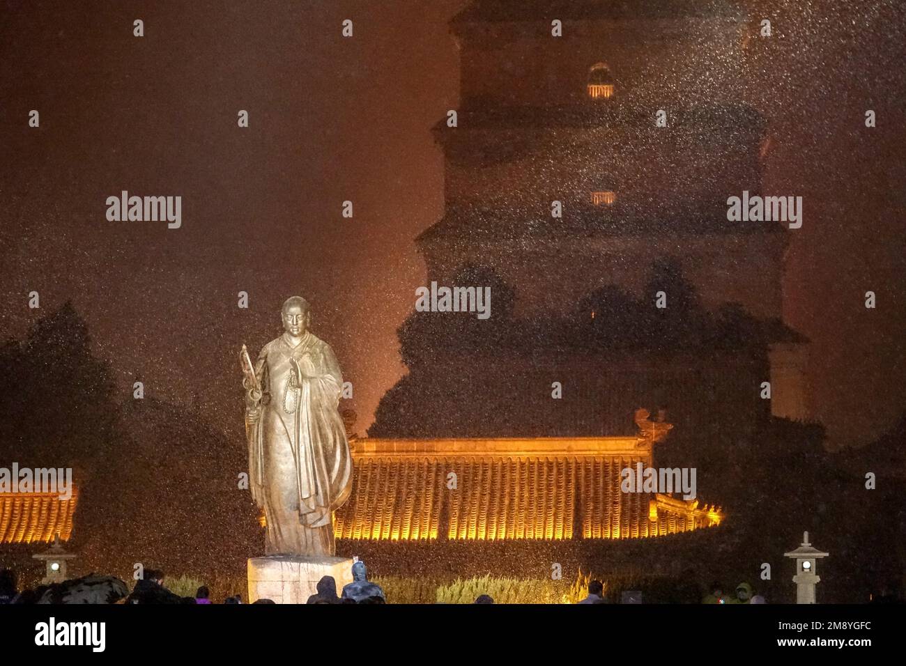 Tourists visit the Grand Tang Mall in the snow in Xi'an City, northwest ...