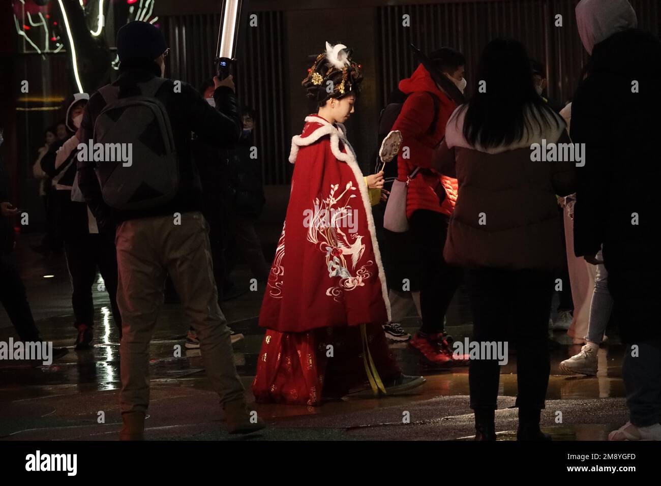 Tourists visit the Grand Tang Mall in the snow in Xi'an City, northwest ...
