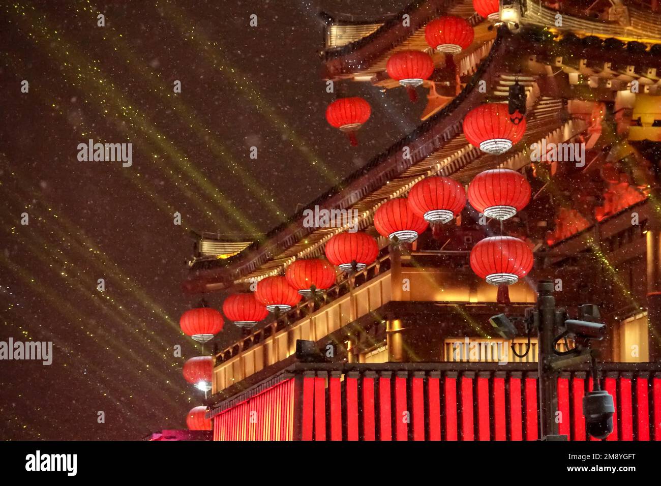 Tourists visit the Grand Tang Mall in the snow in Xi'an City, northwest ...