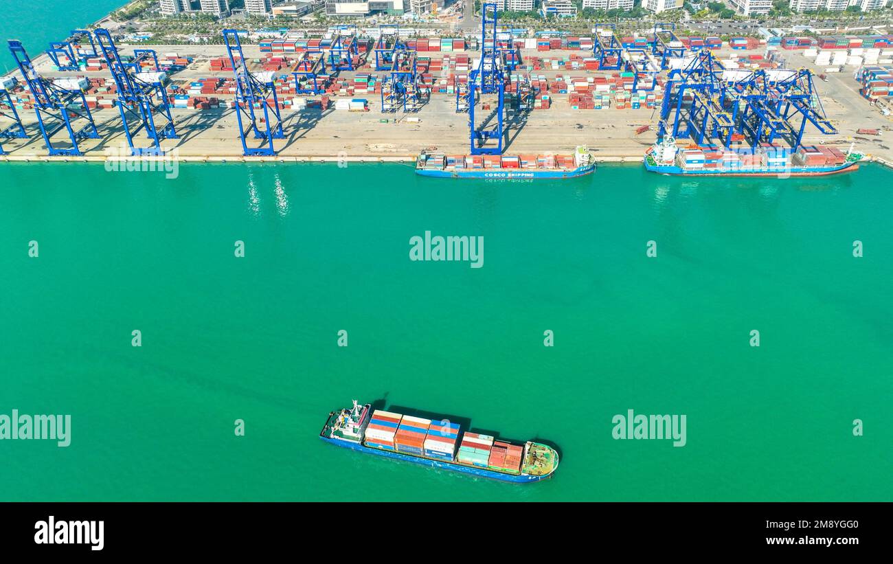 Aerial photo shows the busy container terminal at Haikou Port in Haikou ...