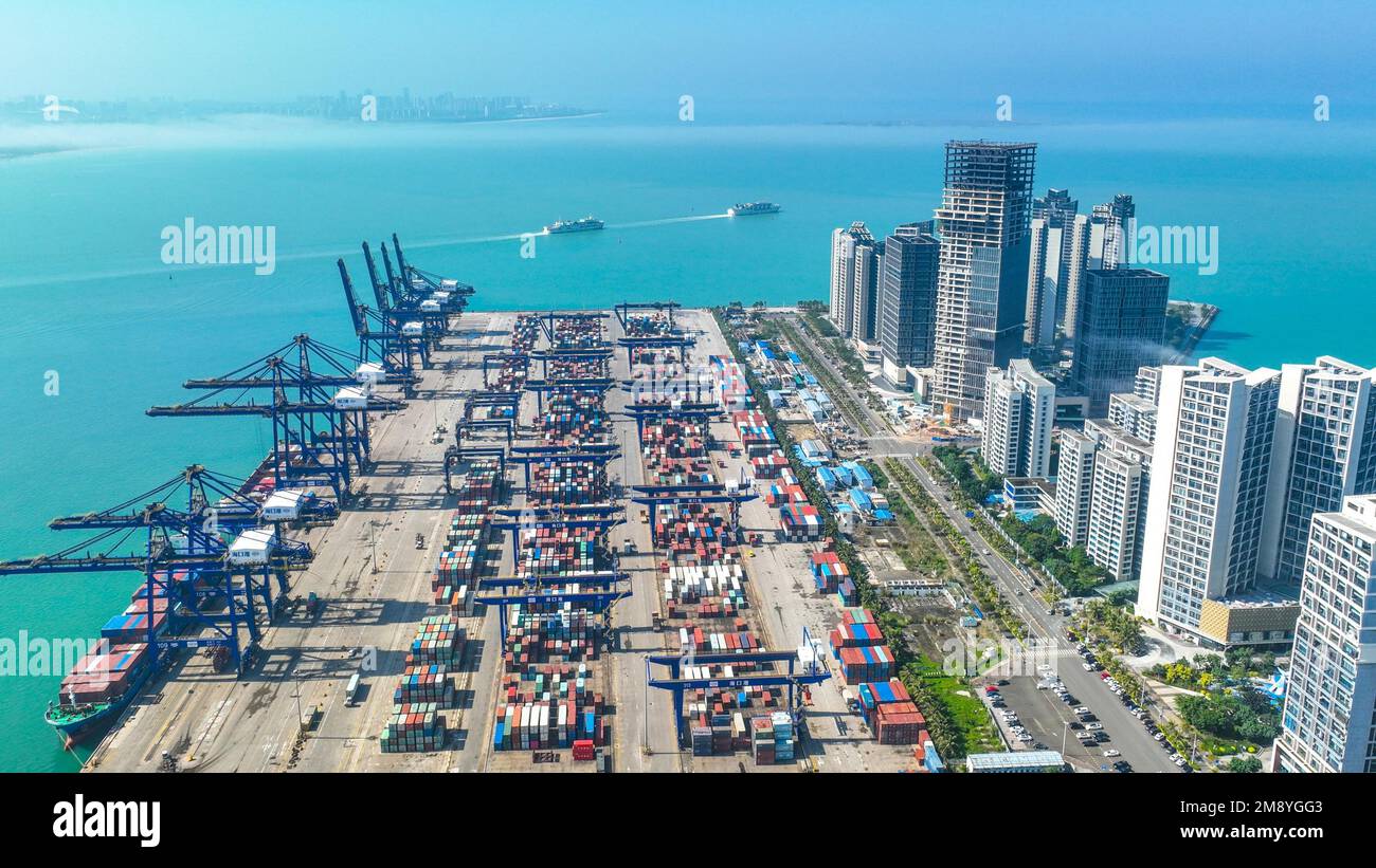 Aerial photo shows the busy container terminal at Haikou Port in Haikou ...