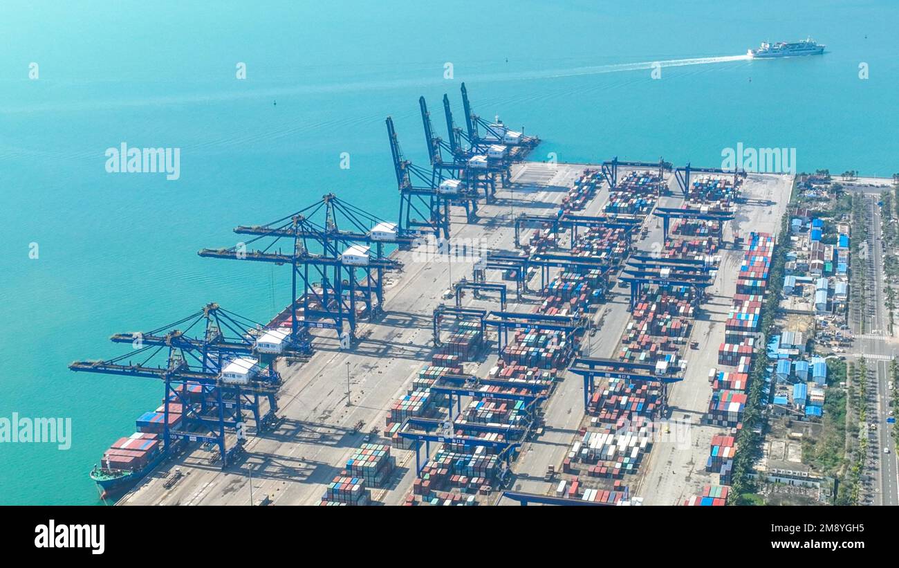 Aerial photo shows the busy container terminal at Haikou Port in Haikou ...