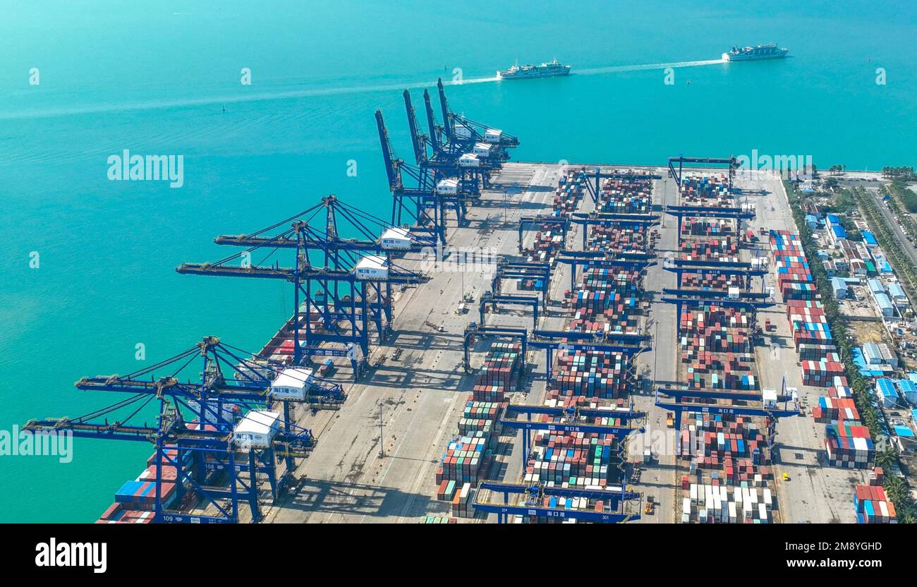 Aerial photo shows the busy container terminal at Haikou Port in Haikou ...