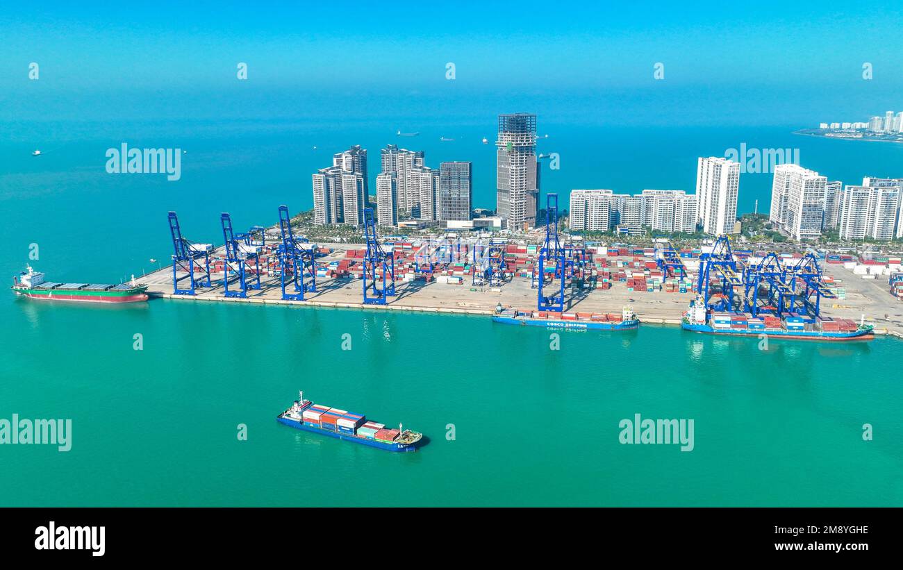 Aerial photo shows the busy container terminal at Haikou Port in Haikou ...