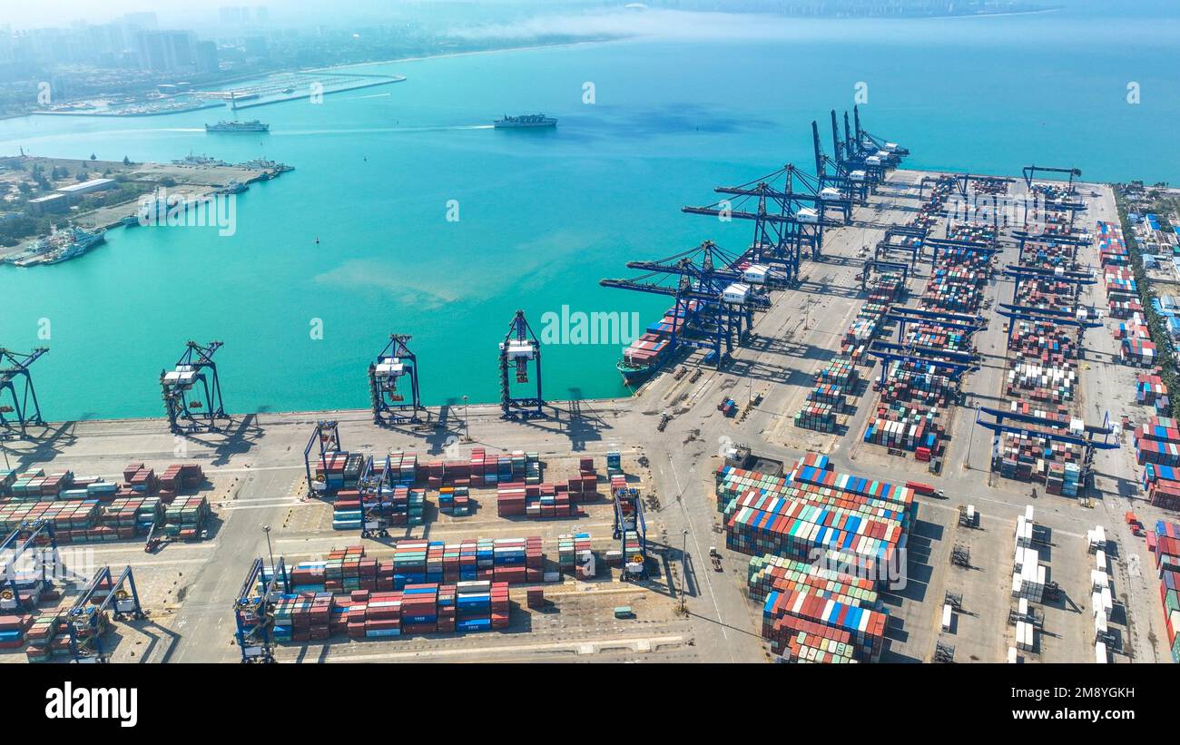Aerial photo shows the busy container terminal at Haikou Port in Haikou ...