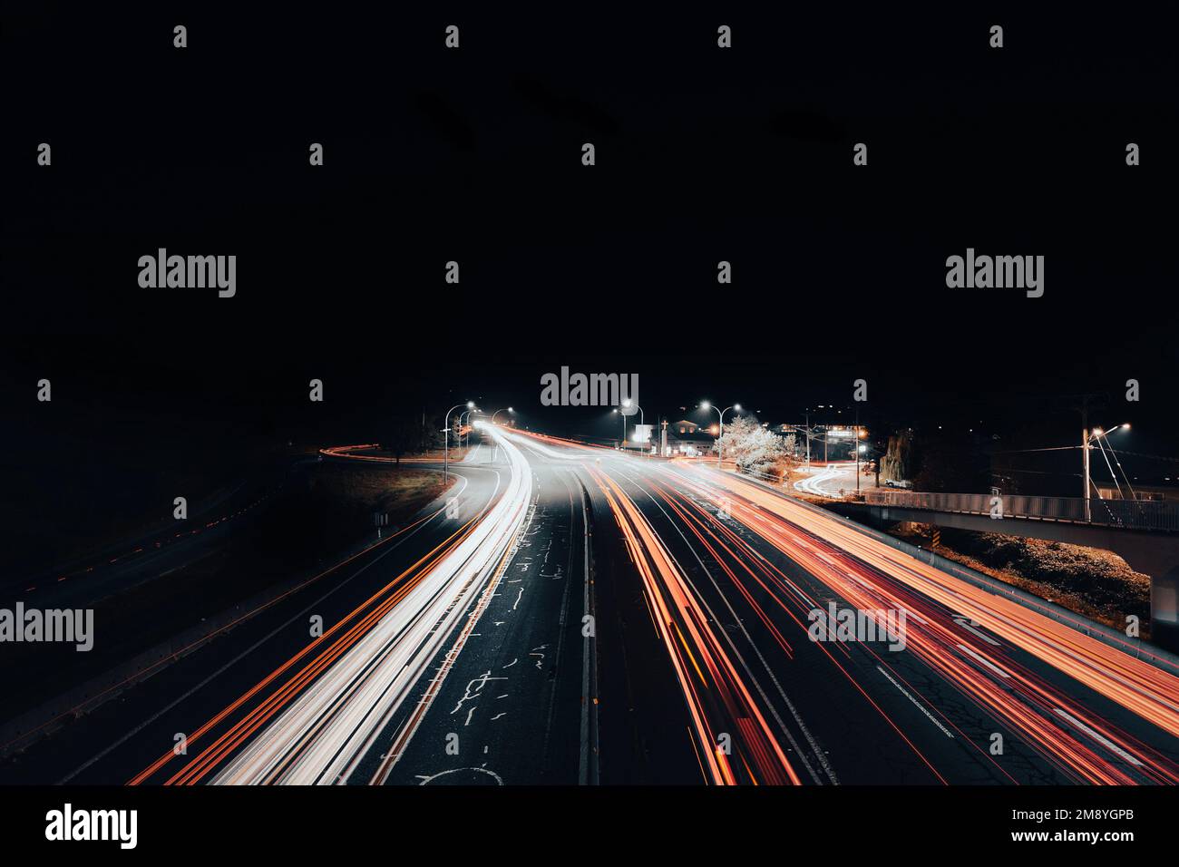 A long exposure shot of a traffic on a highway at night Stock Photo - Alamy