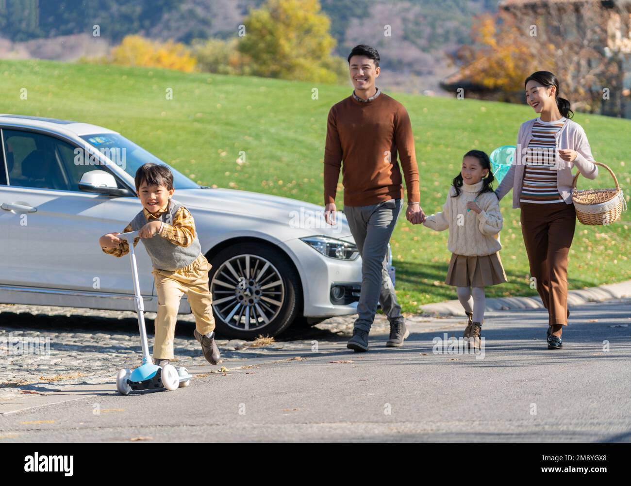 A young couple with children here Stock Photo - Alamy