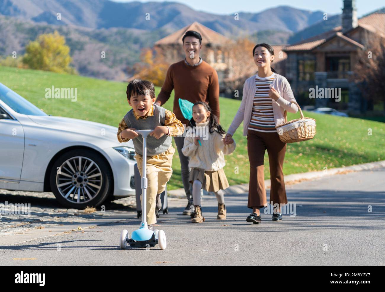 A young couple with children here Stock Photo - Alamy