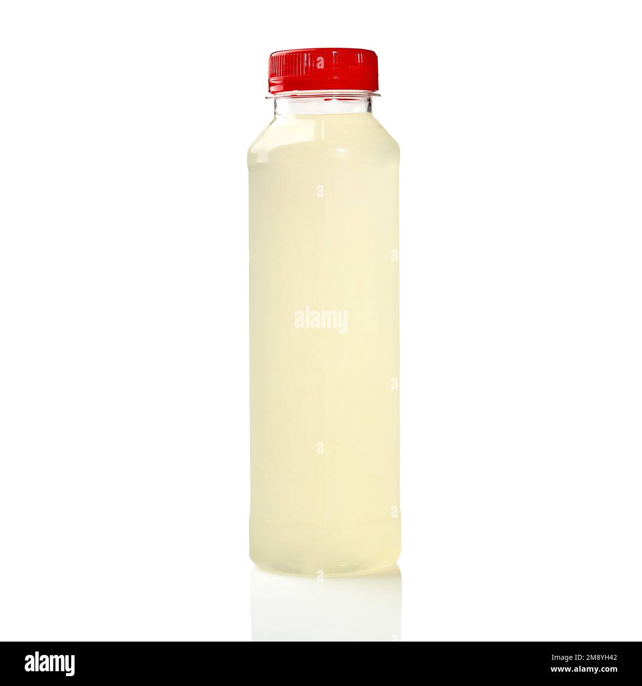 Plastic bottle of ginger lemonade on white background Stock Photo - Alamy