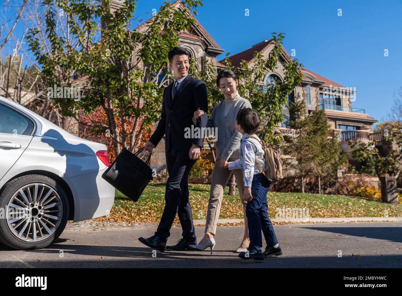 A young couple to send their children to school Stock Photo - Alamy