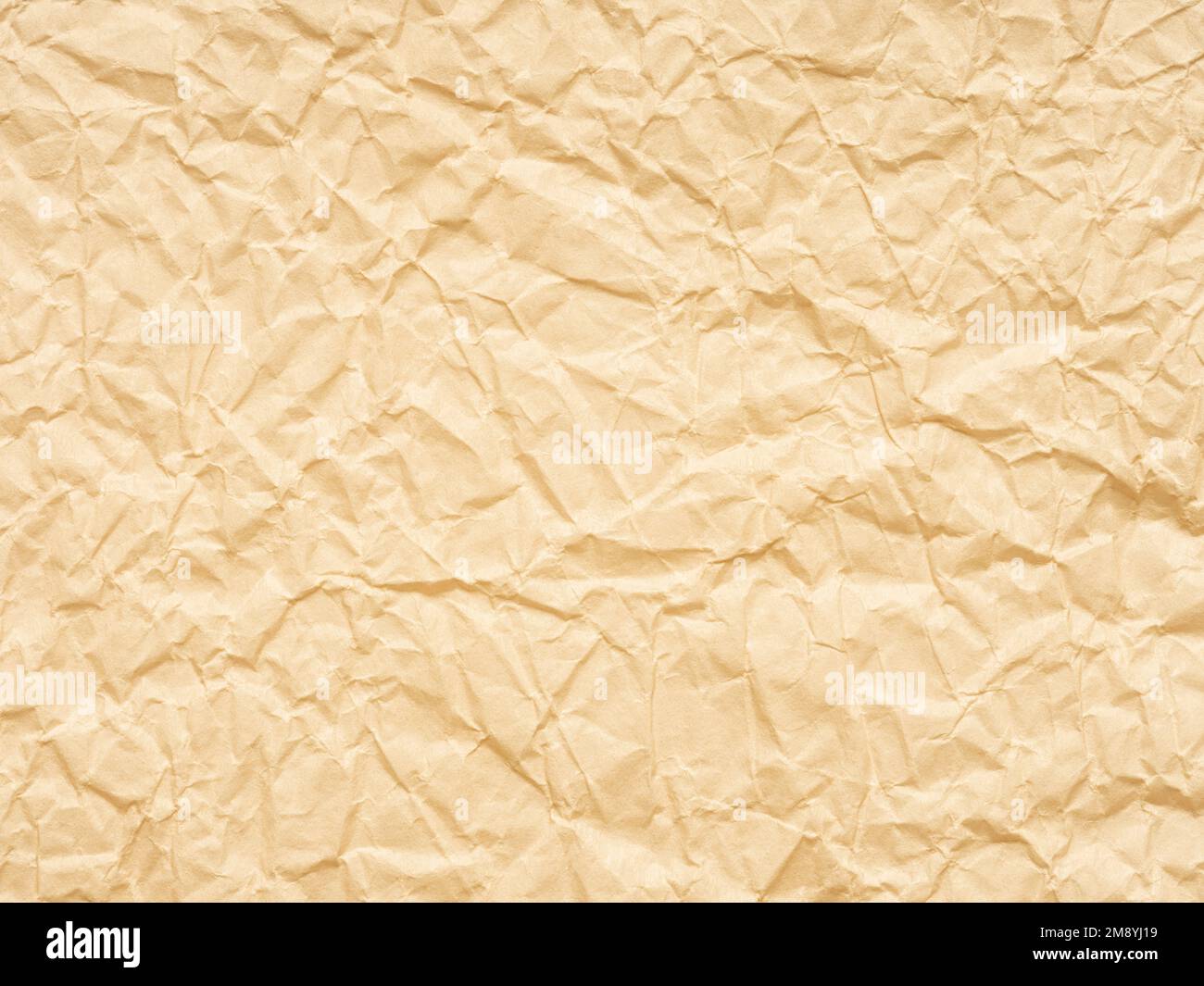 Extra soft beige or yellow crumpled paper texture. Blank grunge page or ...