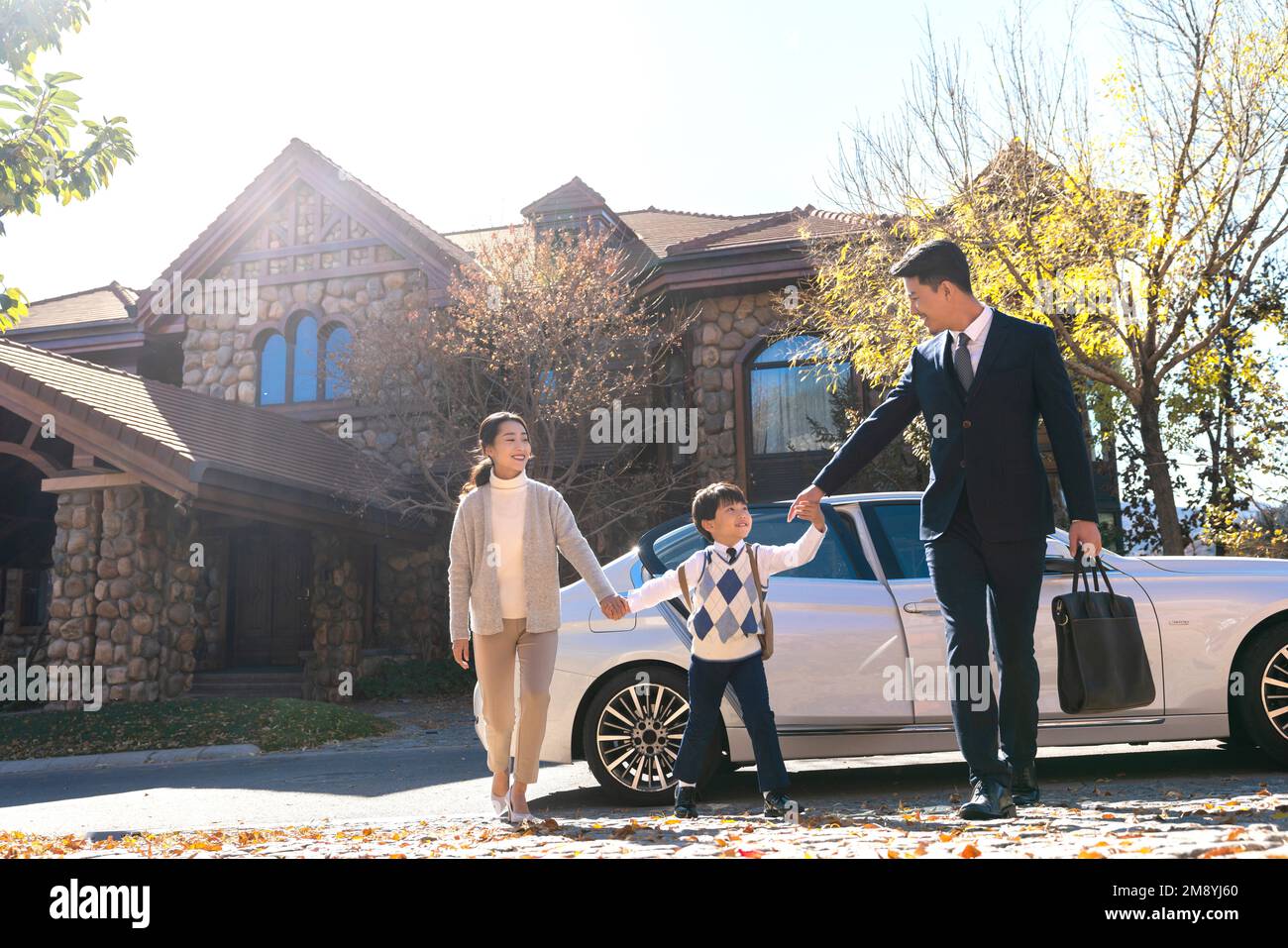 Chinese parents pick up their children from school hi-res stock ...