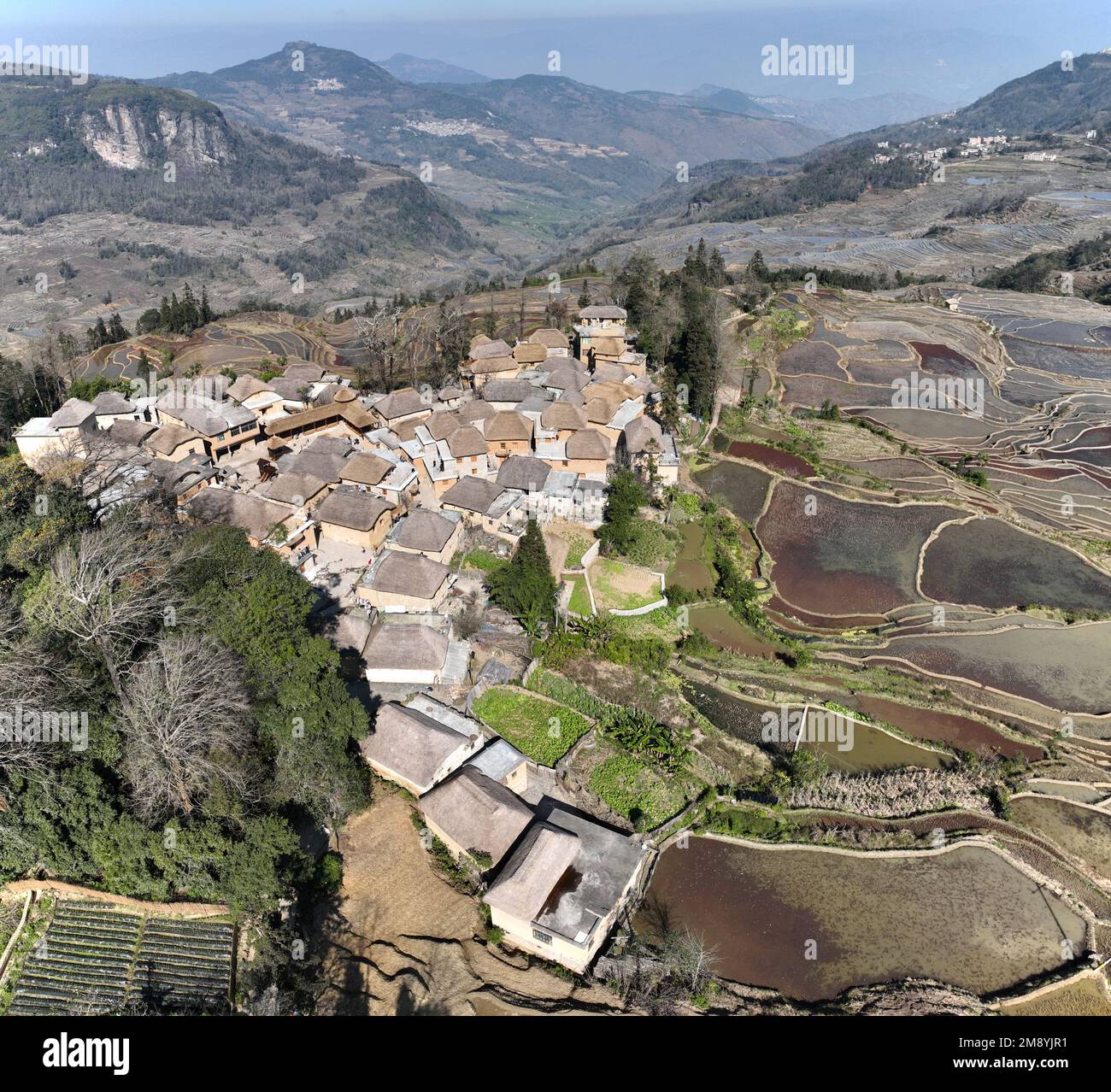 Aerial view of rice terraces and remote village in China Stock Photo ...