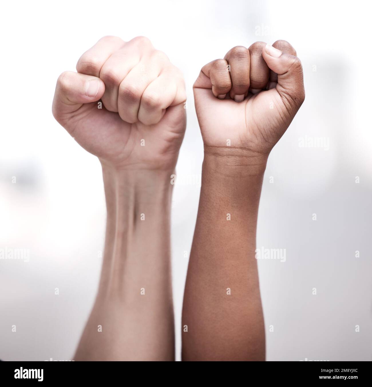 Raised fist power female hi-res stock photography and images - Alamy
