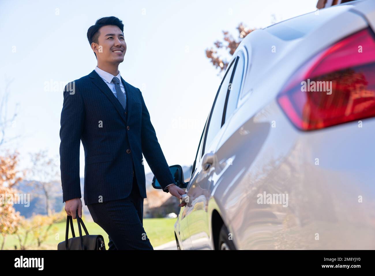 A young business man to work Stock Photo - Alamy