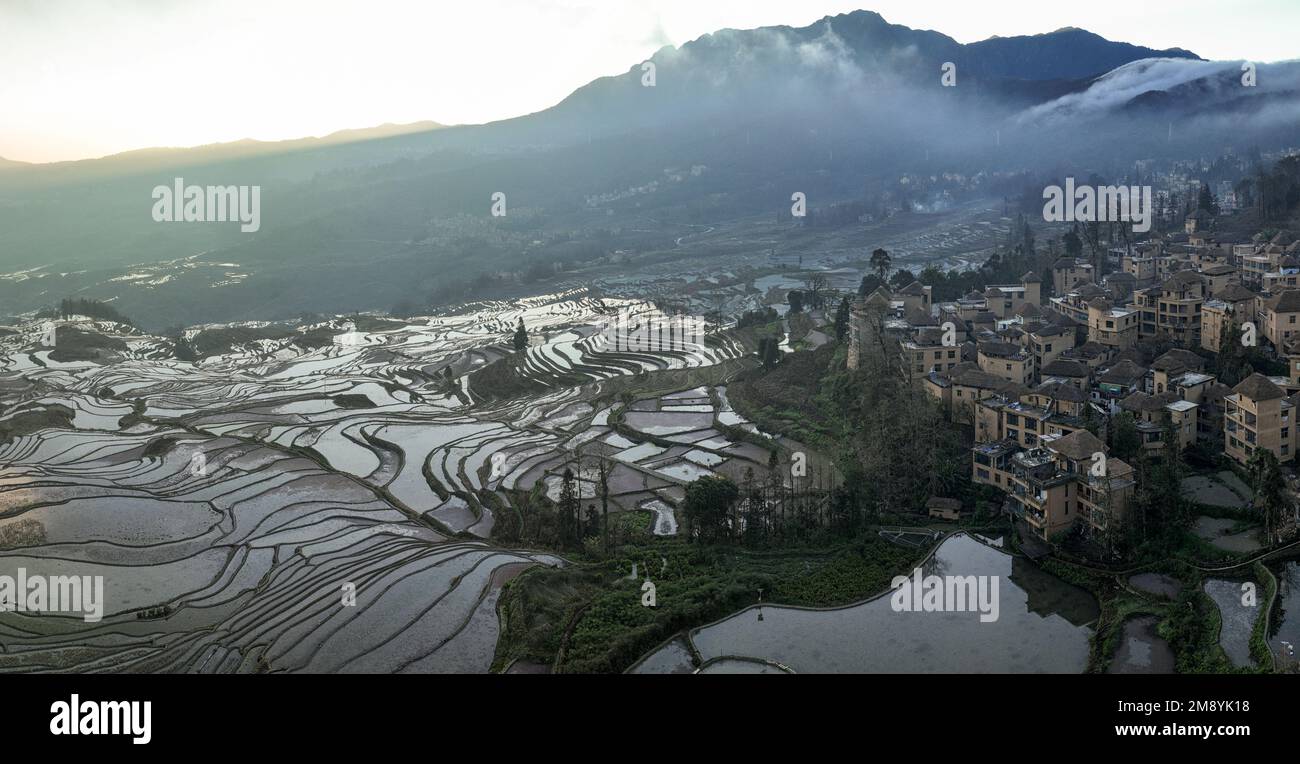 Aerial view of rice terraces and remote village in China Stock Photo ...