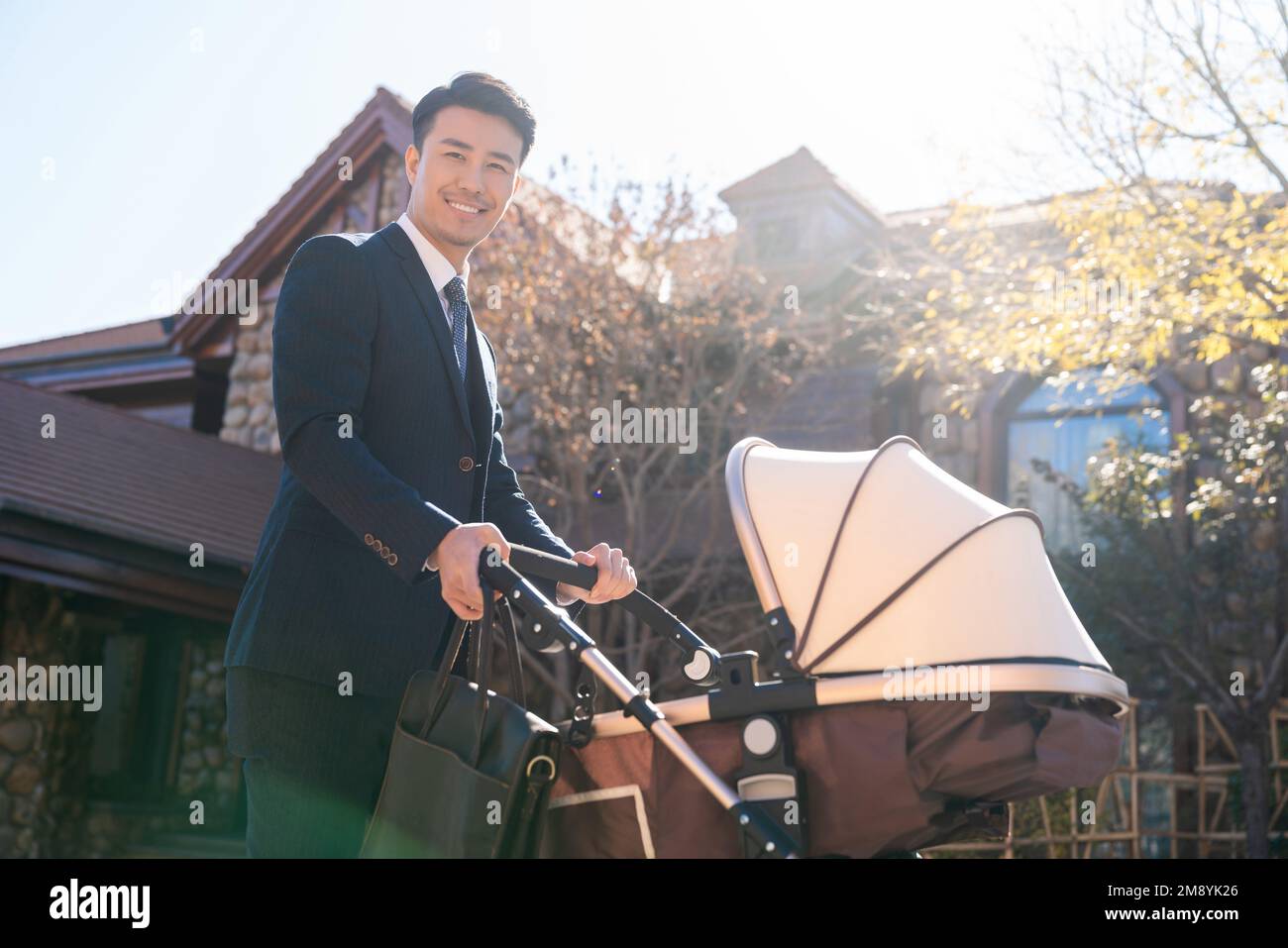 Pushing a babies pram hi-res stock photography and images - Alamy