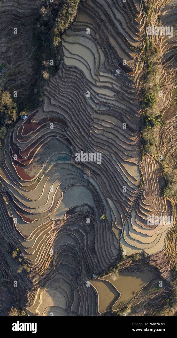 Aerial view of rice terraces and remote village in China Stock Photo ...