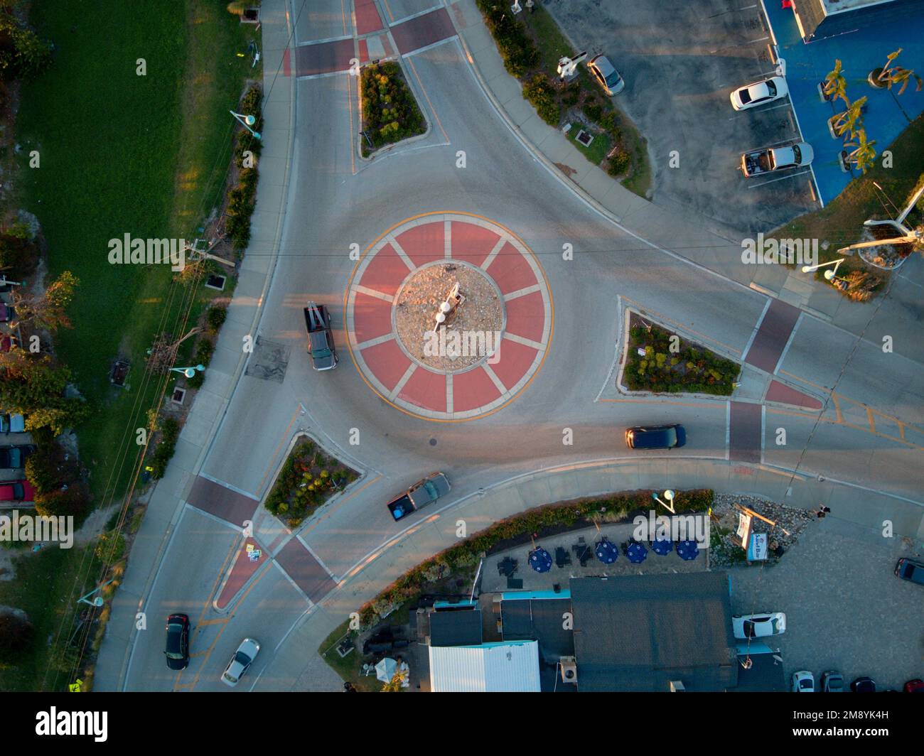 An aerial view of a roundabout with cars Stock Photo - Alamy