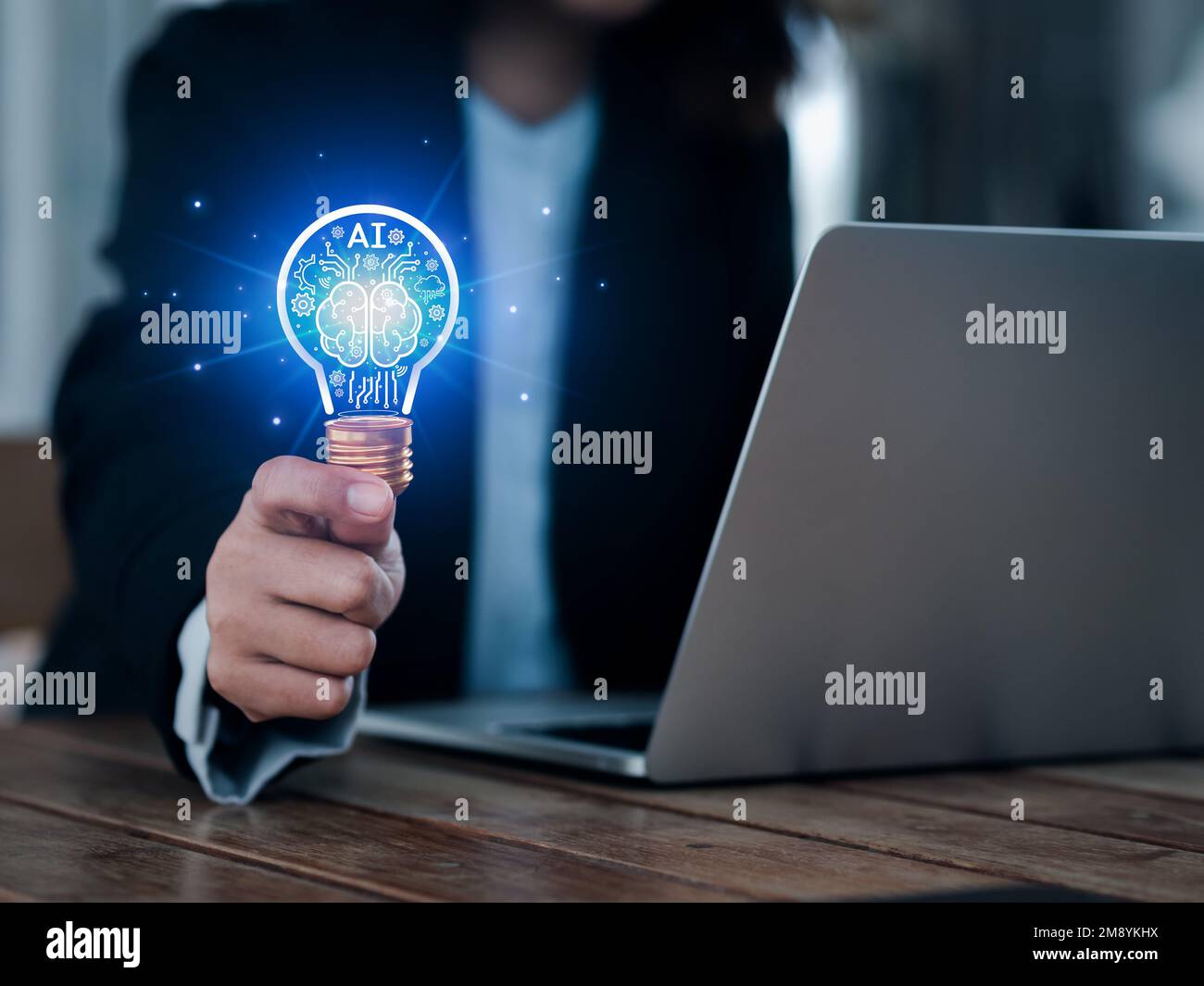 Artificial intelligence technology concept. Glow digital light bulb graphics with AI brain ...