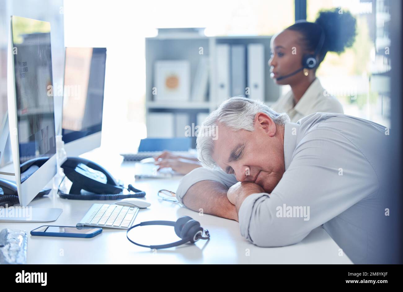 Its been a slow day, I might as well sleep. a mature call centre agent ...