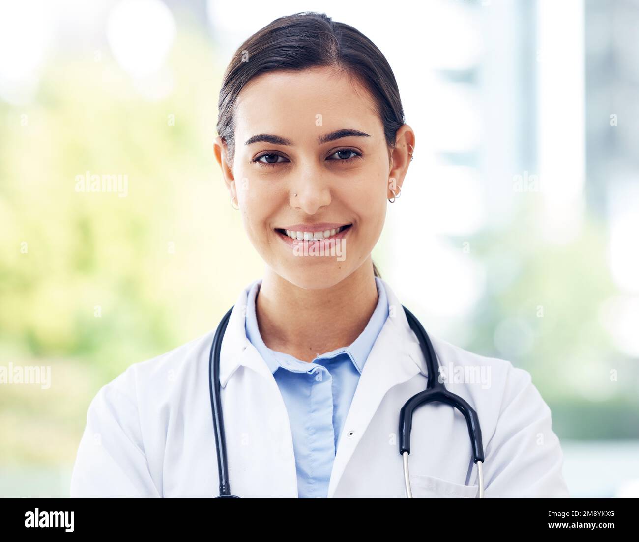 Its my duty to make a real difference. Portrait of a young doctors ...