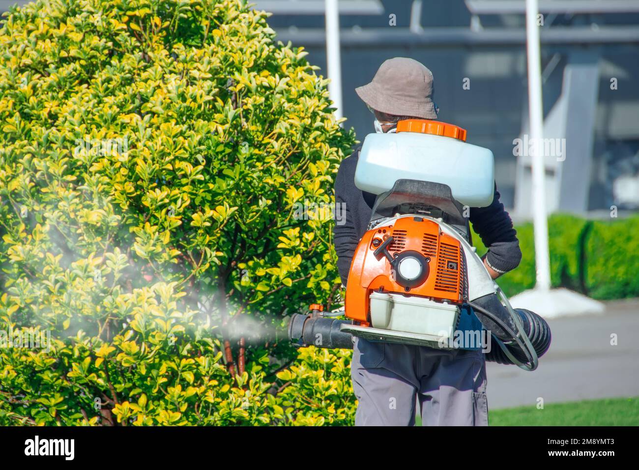 Farmer spraying potato field hi-res stock photography and images - Alamy