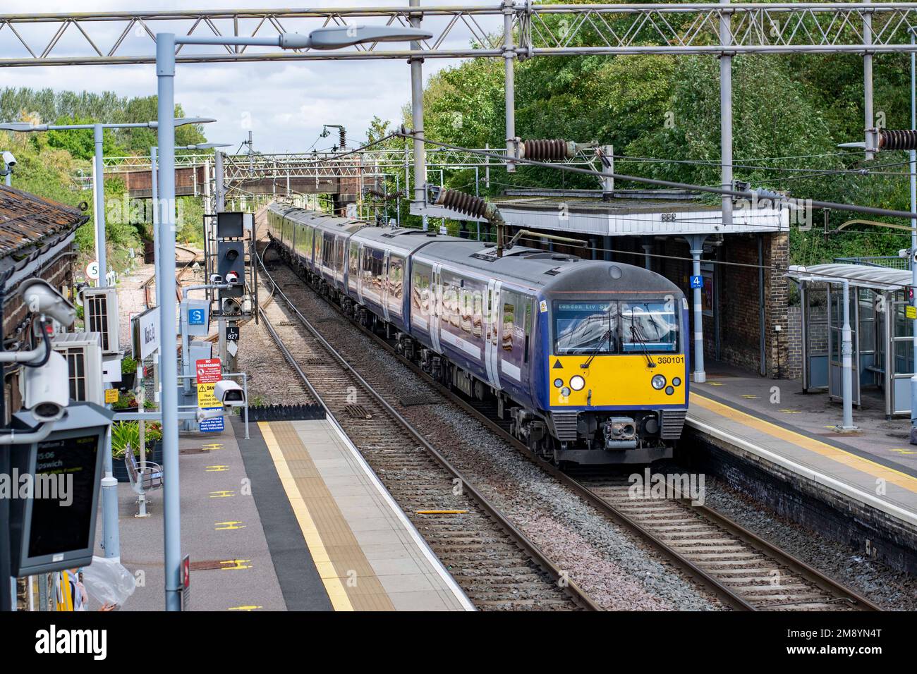 Marks Tey Railway Station Essex, with Locomotive and carriages halted Stock Photo - Alamy