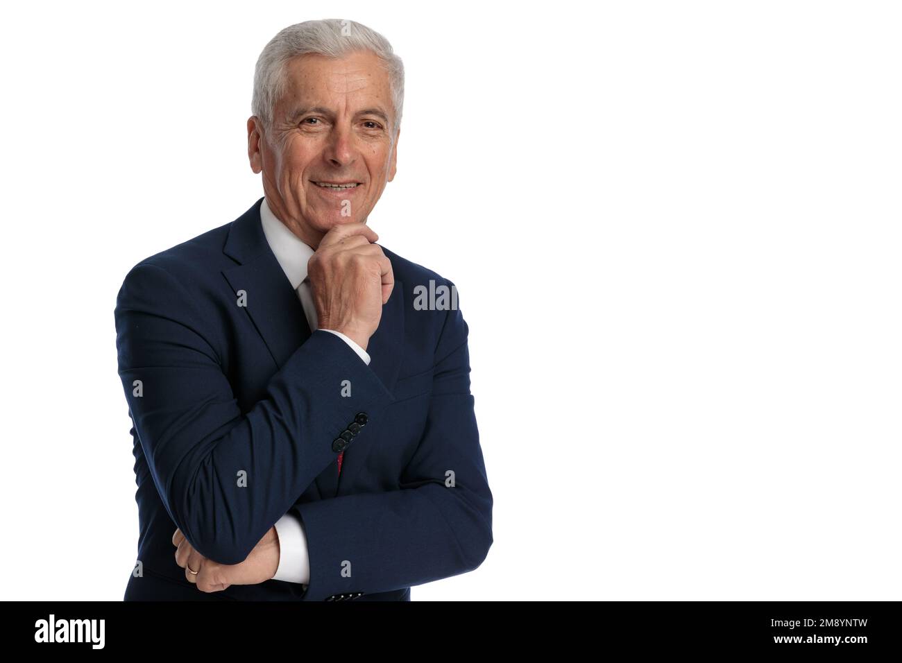 old business man scratching his chin and smiling at the camera Stock ...