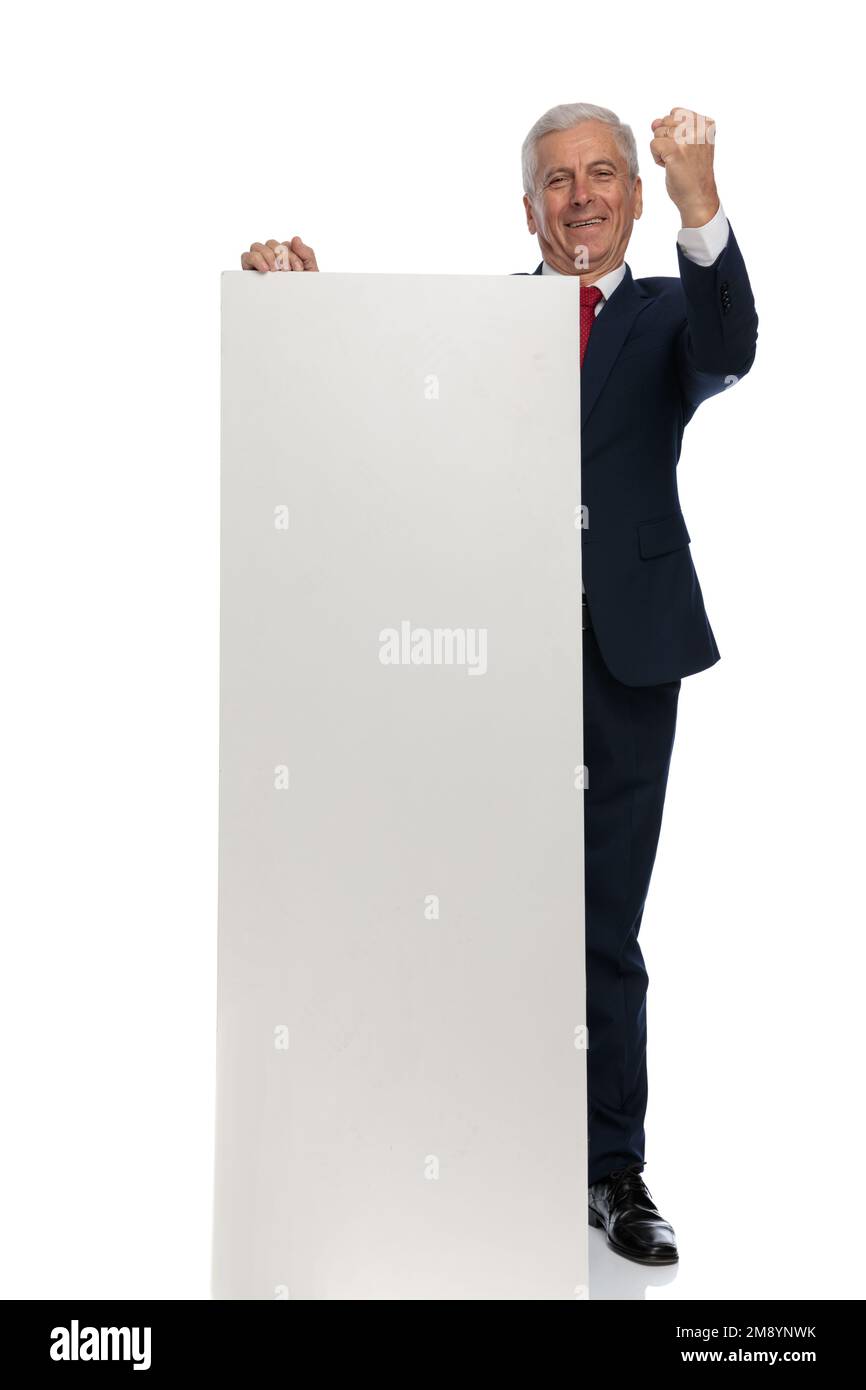 full body picture of a Businessman excited to celebrate success with ...