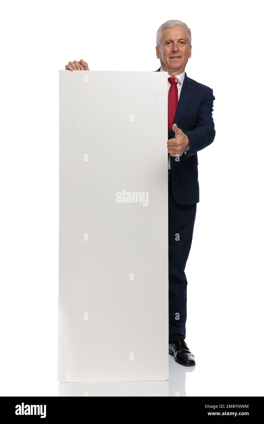 full body picture of an Old businessman giving a thumbs up showing ...