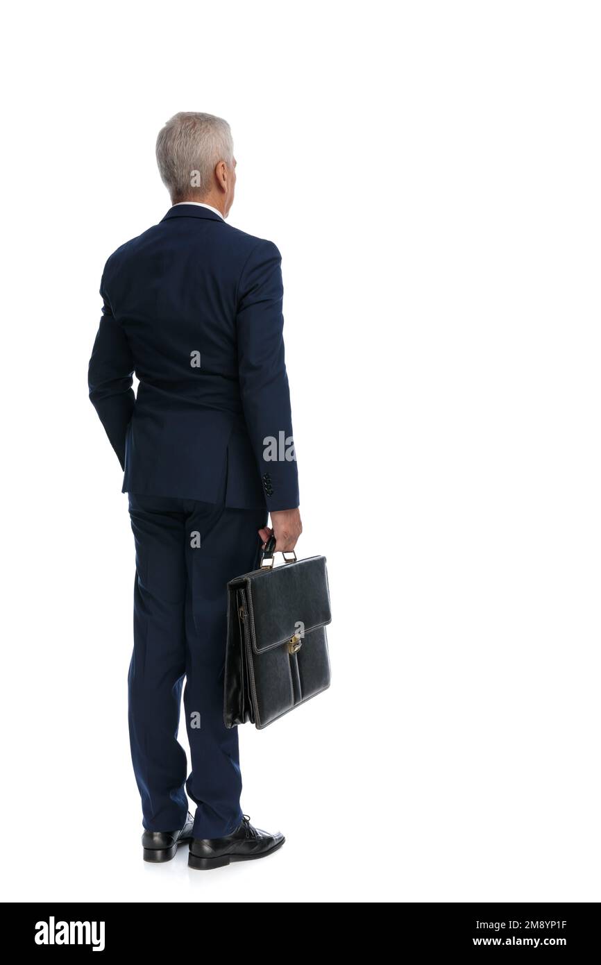 full body picture and a rear view of an old business man waiting in ...