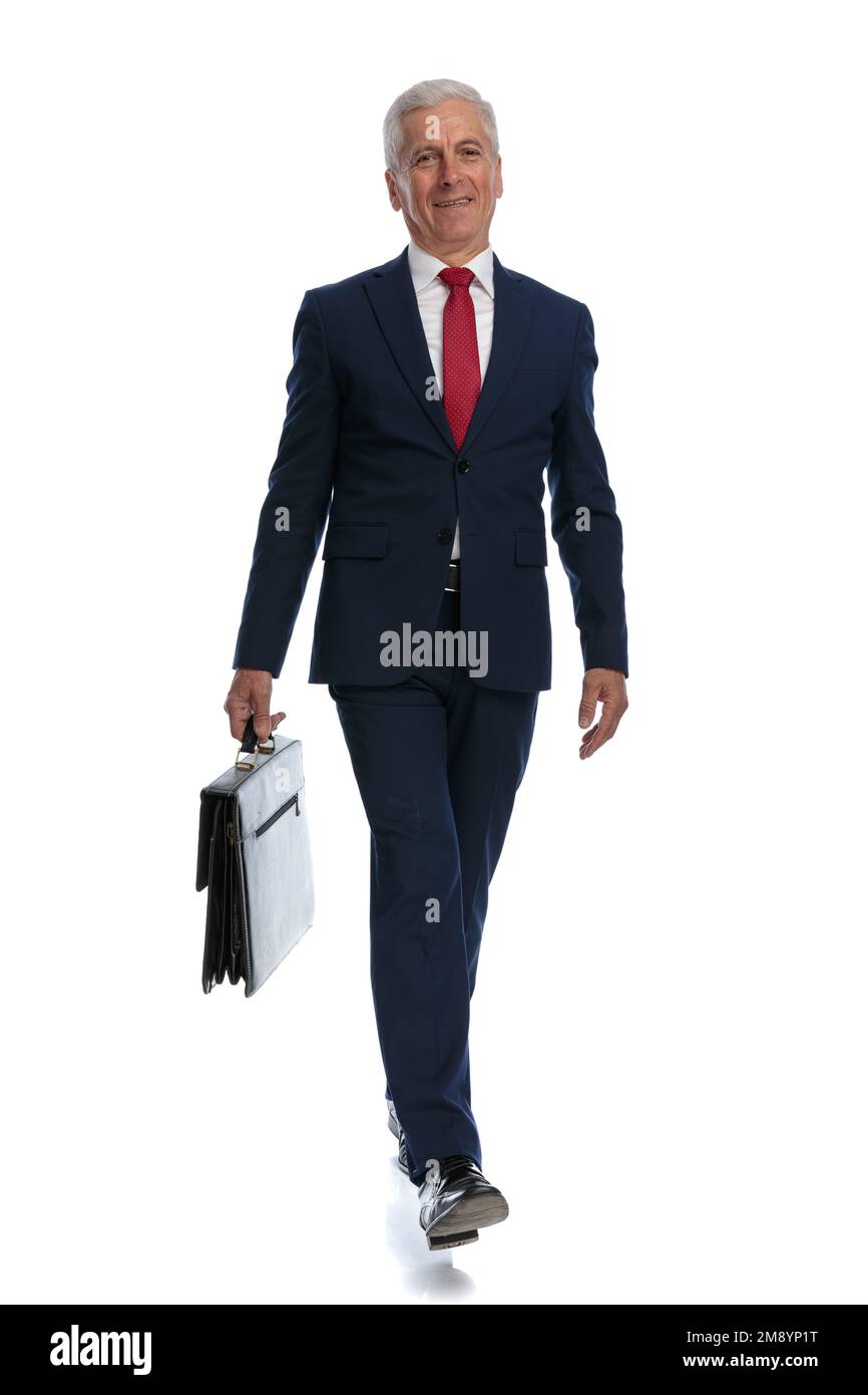 full body picture of an old businessman going to work relaxed and a ...