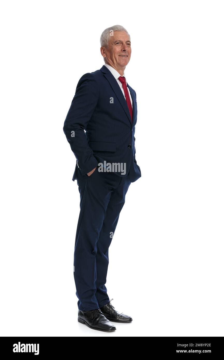 Full body picture and side view of an happy old businessman looking ...
