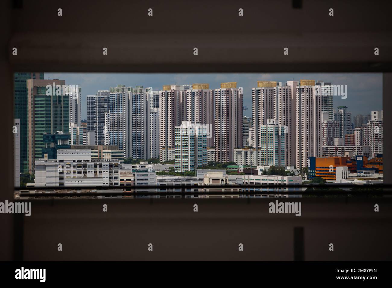 High rise housing estate at Toa Payoh area through the corridor window ...