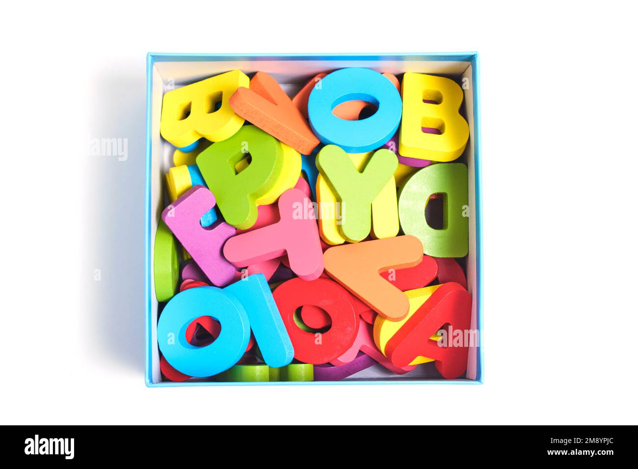 Open box white background, full of letters English alphabet Stock Photo ...