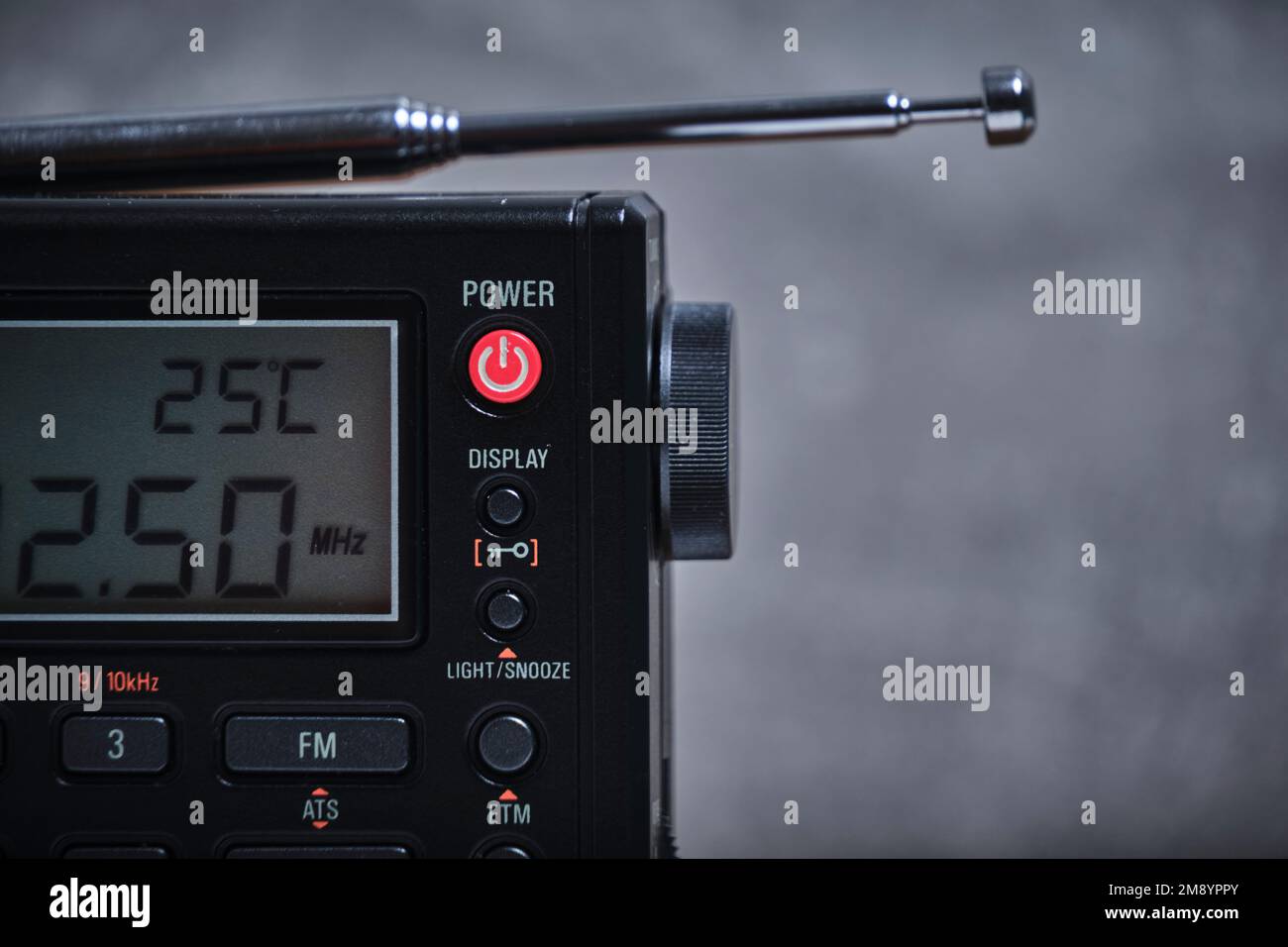 Digital radio receiver with elongated antenna gray blurry background ...