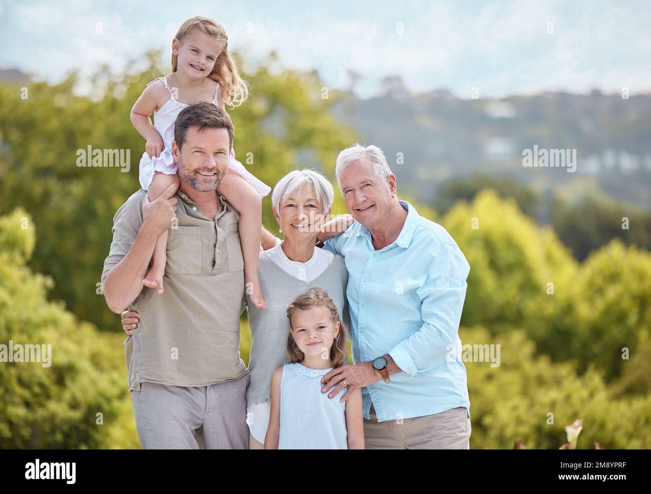 The cement that binds closer together. a family standing together in a ...