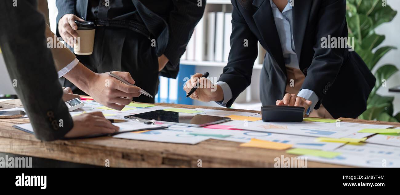 Business people analyzing investment graph meeting brainstorming and ...