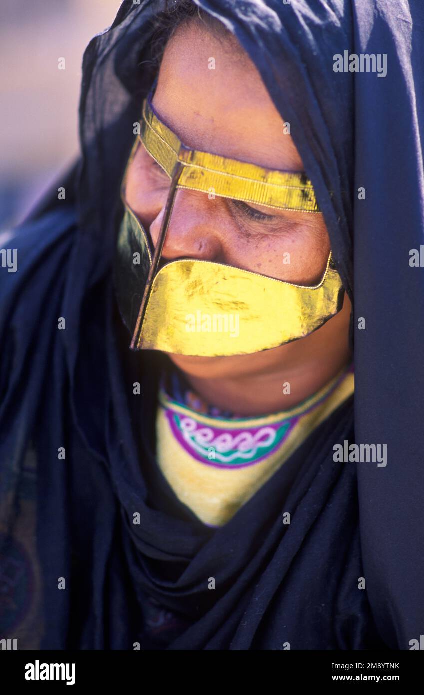 Bahrain, woman with traditional dress and burghu face covering Stock ...