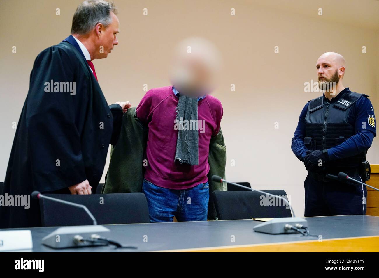 Heidelberg, Germany. 16th Jan, 2023. The defendant (M) talks to his ...