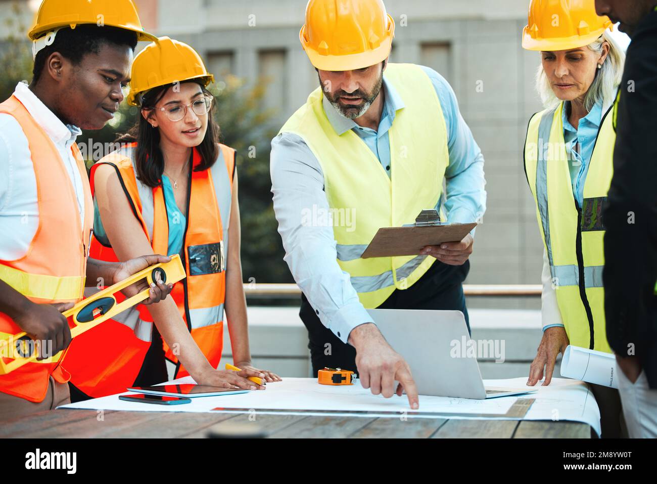 Lets focus on this side of the building. a diverse group of contractors ...
