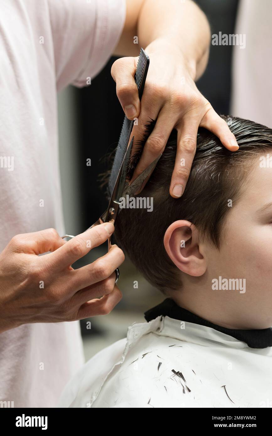 A Little Boy in a Hairdressing Salon Stock Photo - Alamy