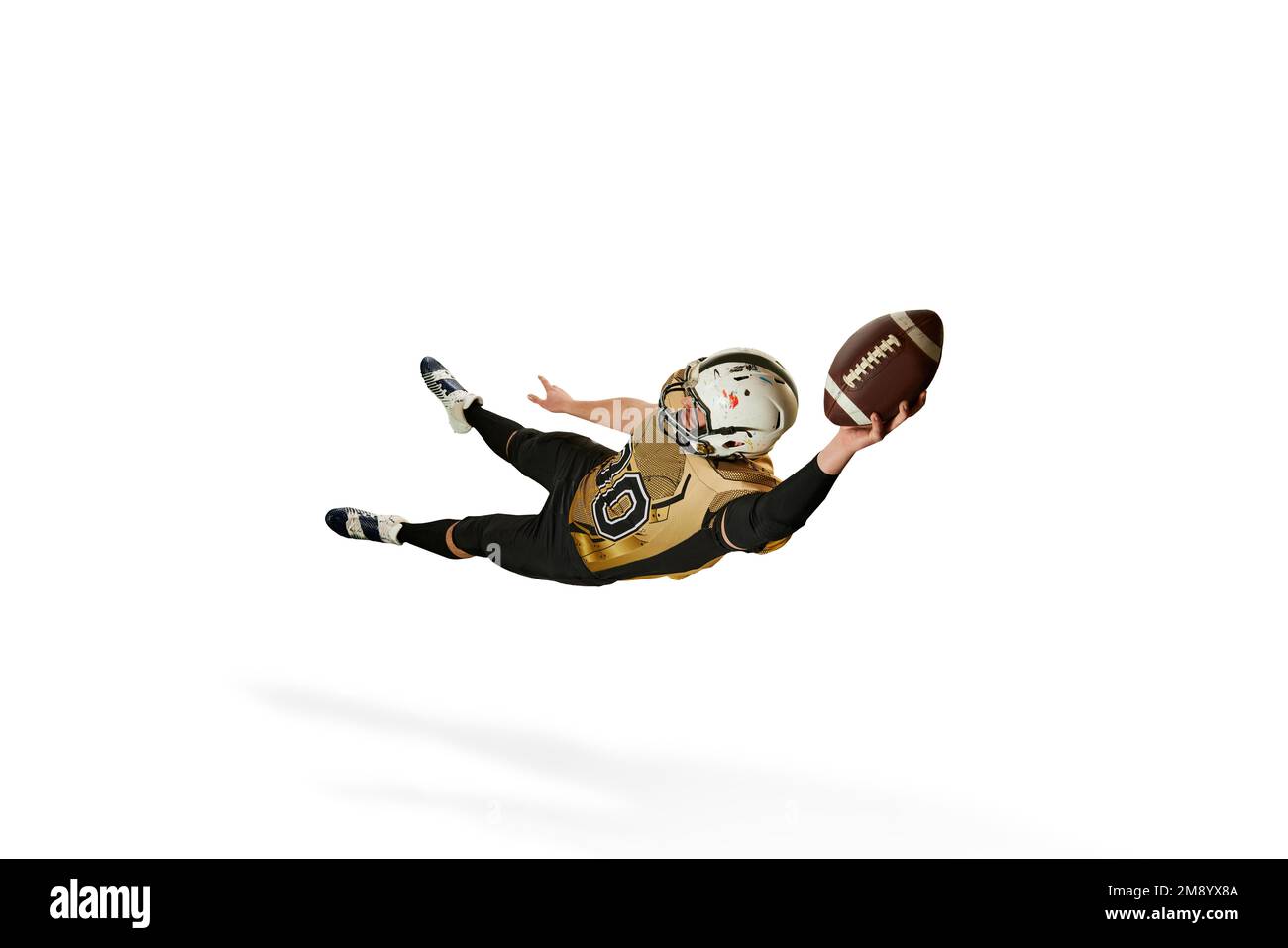 Man man jumping to catch a ball hi-res stock photography and images - Alamy