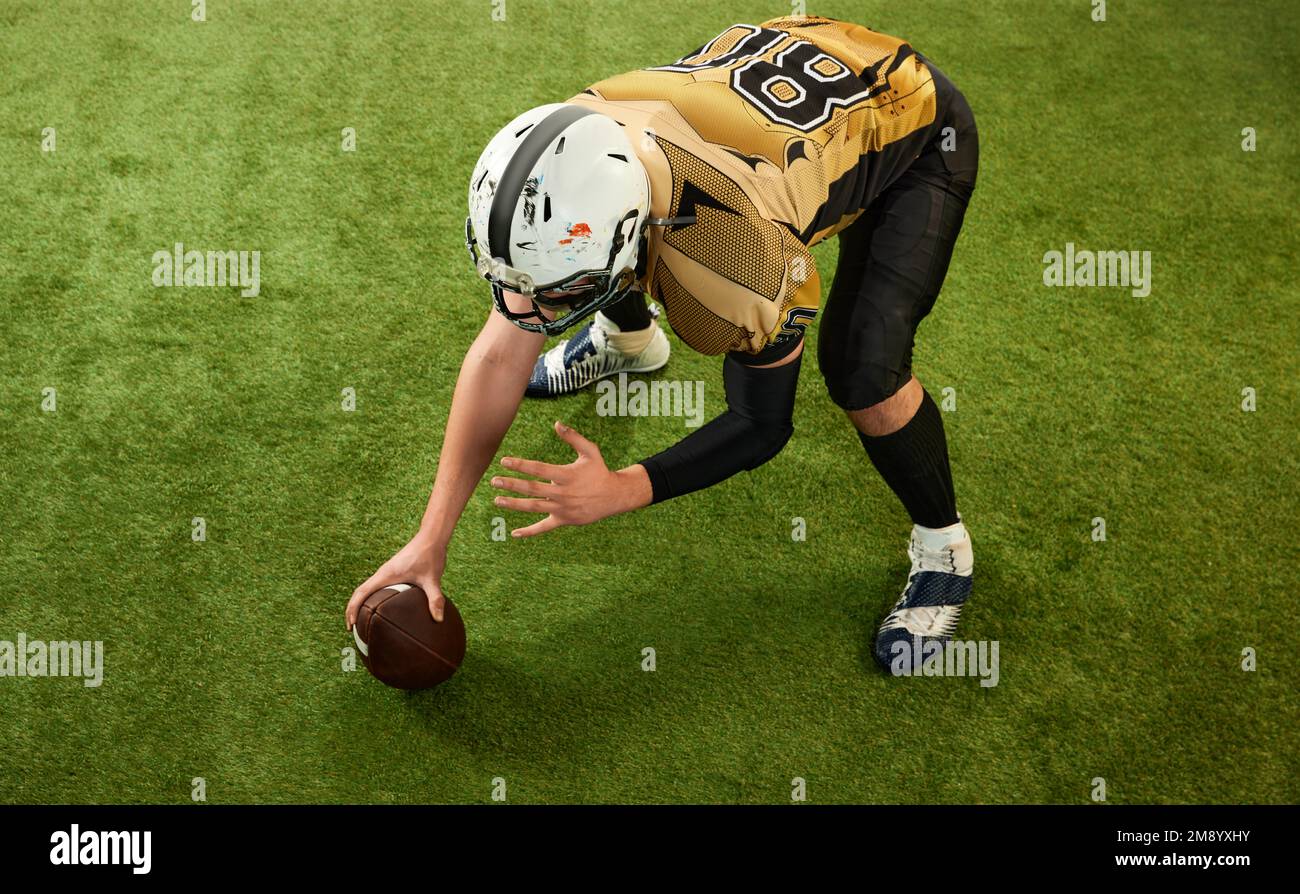 Top view. Man, american football player in motion, training, starting ...