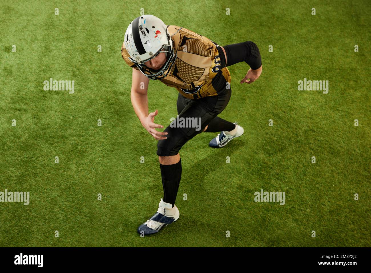 Top view. Man, american football player in motion, training, preparing ...