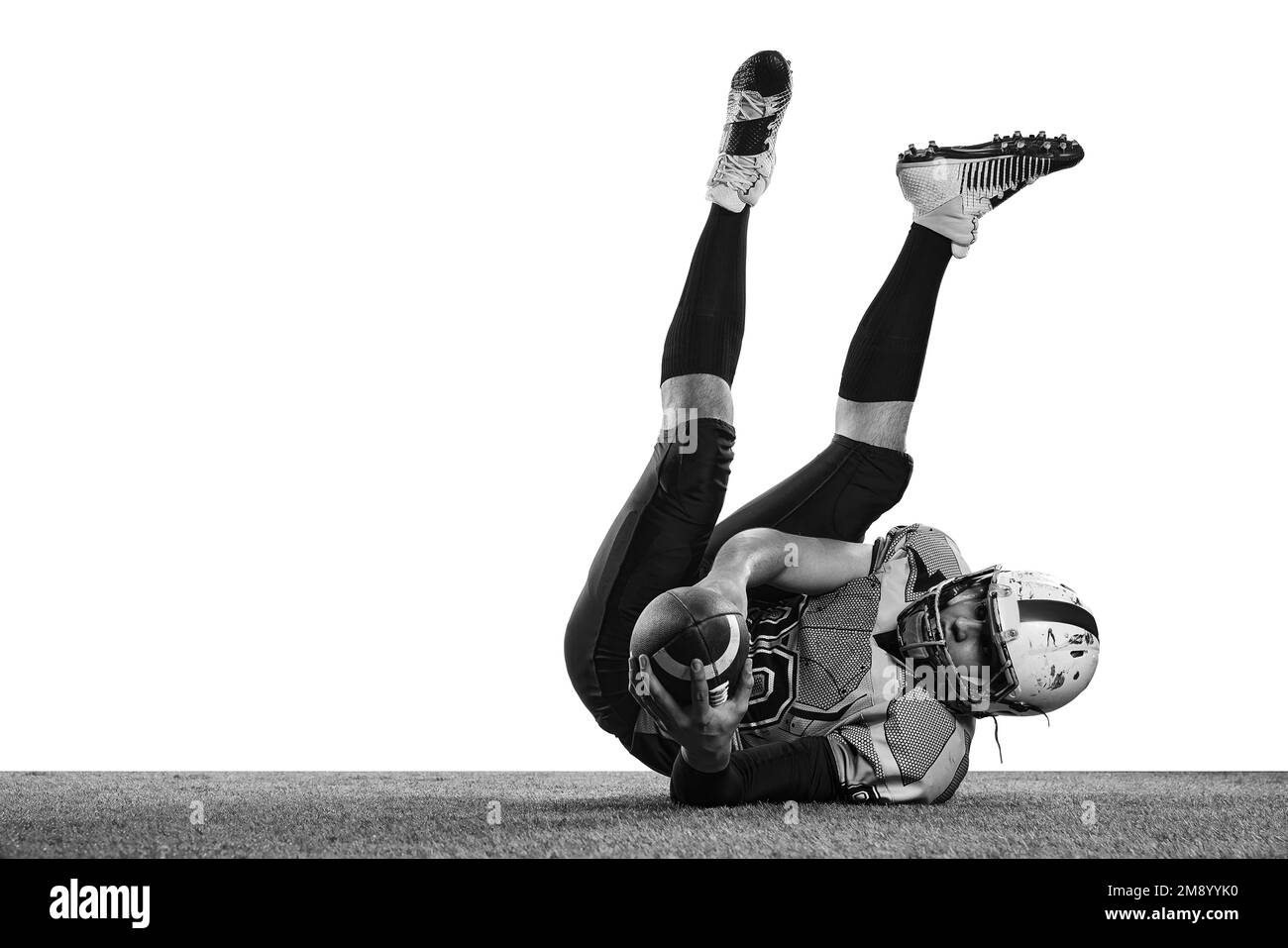 Black and white photo. Catching ball and falling. Man, professional ...