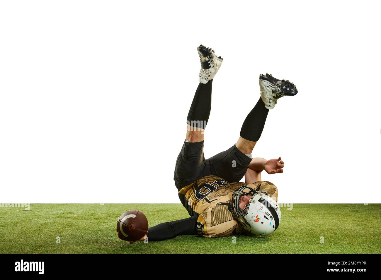 Catching ball and falling. Man, professional american football player ...