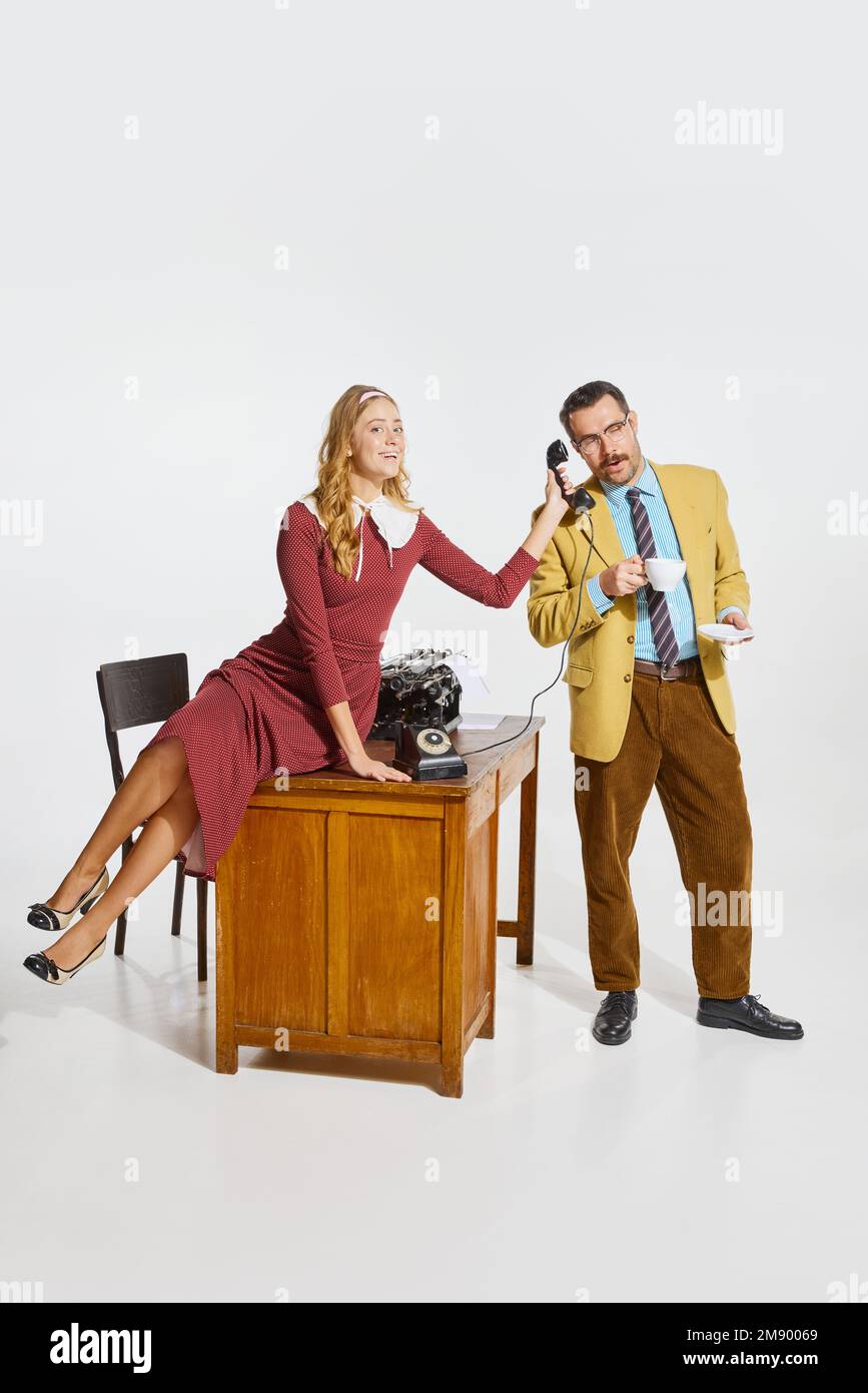 Cheerful woman, personal assistant holding phone handset for ...