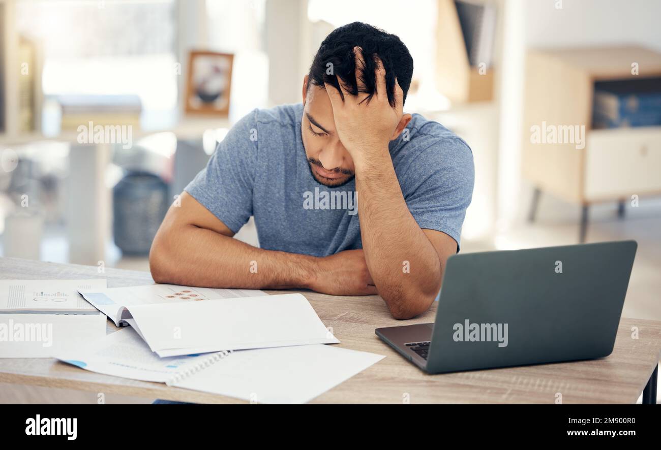 Why is there so much work to do. a young businessman looking stressed ...